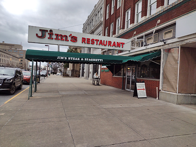 Jim's iconic red sign has been beckoning hungry Huntington locals for decades &ndash; a neon promise of steak perfection awaiting inside.