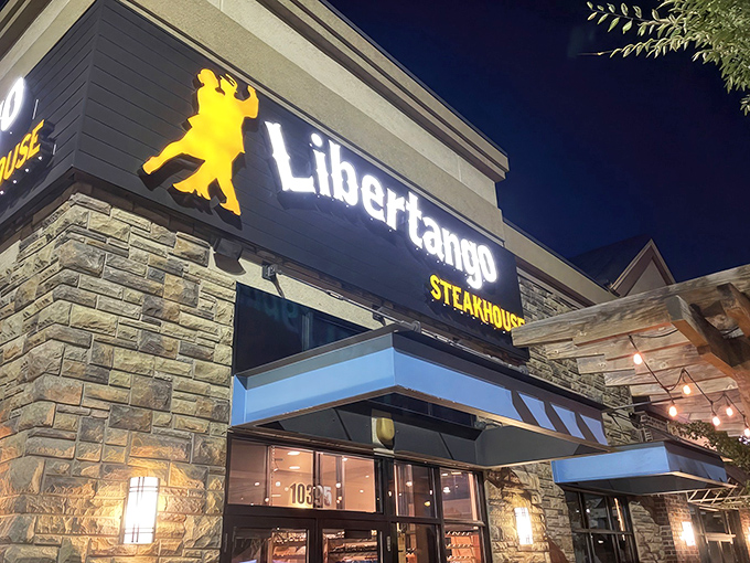 Libertango's glowing storefront beckons like a warm hug in the night, promising Argentine-style steak adventures within those stone walls.