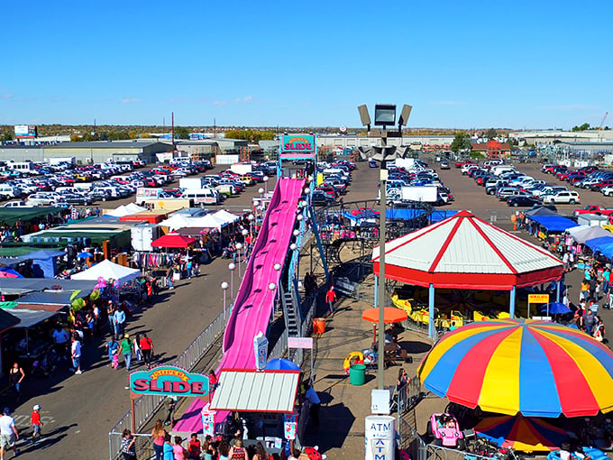 Mile High Flea Market's pink slide isn't just for kids&mdash;it's the perfect landmark when you've forgotten where you parked!