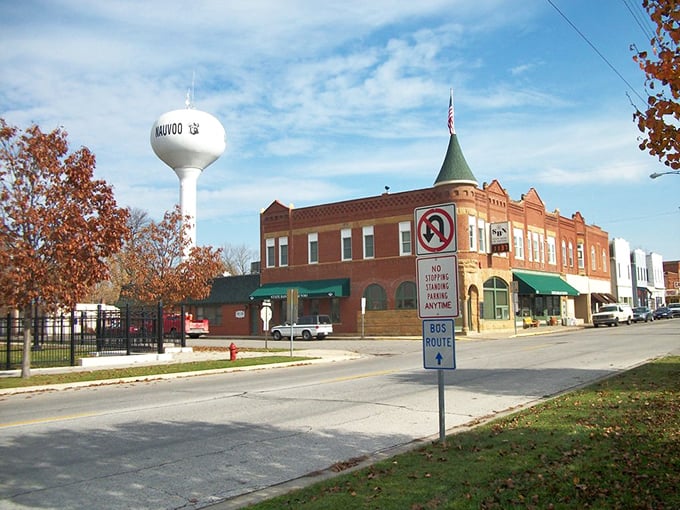 Nauvoo's iconic water tower stands sentinel over brick buildings that have witnessed more small-town drama than a Hallmark movie marathon.
