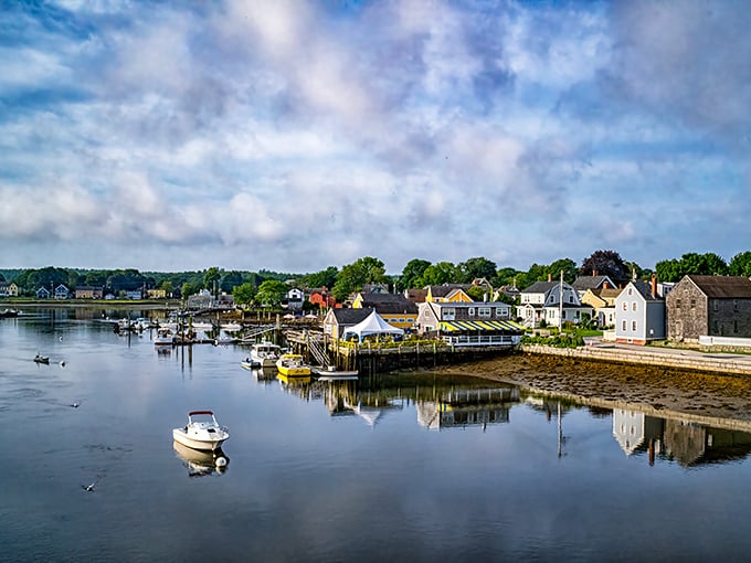 Portsmouth Harbor's morning calm feels like a painting come to life, with boats gently bobbing alongside historic waterfront buildings.