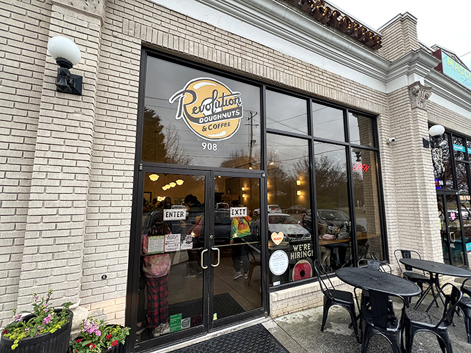 The brick storefront of Revolution Doughnuts invites you in like a warm hug, promising sweet relief from everyday troubles.