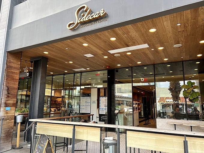 Sidecar's storefront: Where donuts meet design! This sleek shop looks ready to serve up some seriously stylish sweets.