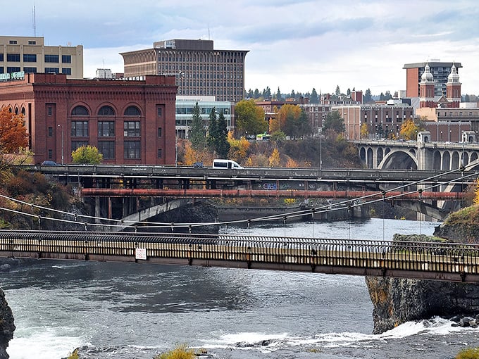 Spokane's iconic bridges span the rushing Spokane River, connecting historic brick buildings with modern downtown life.