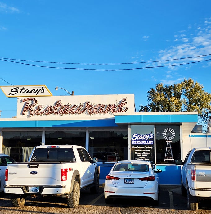 Stacy's Restaurant: "Classic neon meets Midwest charm! Stacy's sign glows like a beacon for hungry travelers seeking home-cooked goodness in Junction City."