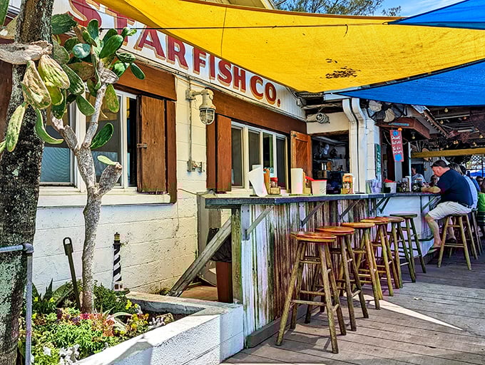 Star Fish Company's weathered wooden counter feels like a portal to Old Florida. Grab a stool and watch your dinner arrive by boat!