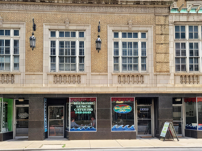 Swiftwater Cafe's storefront beckons like an old friend. Those blue wave designs promise a tsunami of breakfast delights inside!