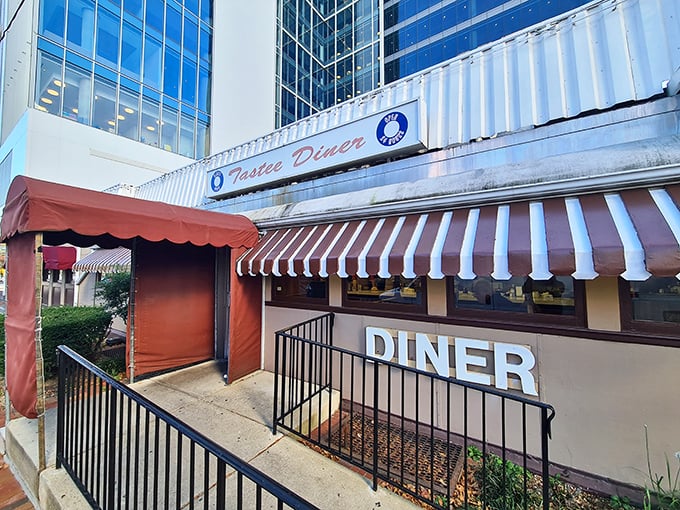 The classic striped awnings of Tastee Diner beckon like a time machine to when breakfast was the most important meal of the day.