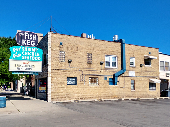 The Fish Keg's vintage sign promises seafood salvation in a no-frills brick building. Chicago's fried fish temple has been calling to hungry souls for decades.