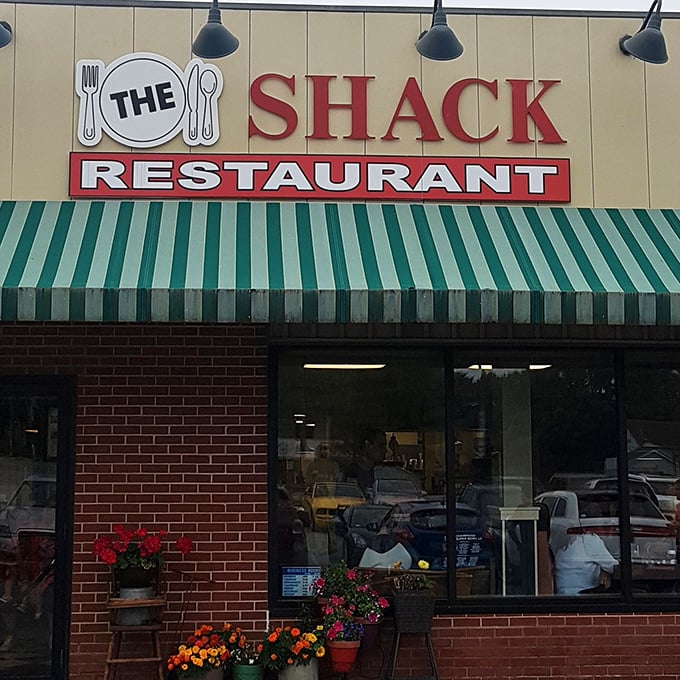 The Shack exterior: "That green-striped awning isn't just decoration&mdash;it's a beacon for breakfast pilgrims seeking pancake nirvana in East Lyme."