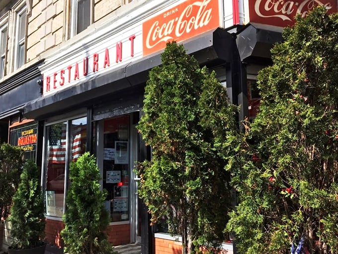 The iconic Coca-Cola sign beckons you into Tom's Restaurant, where Brooklyn's breakfast dreams come true daily.