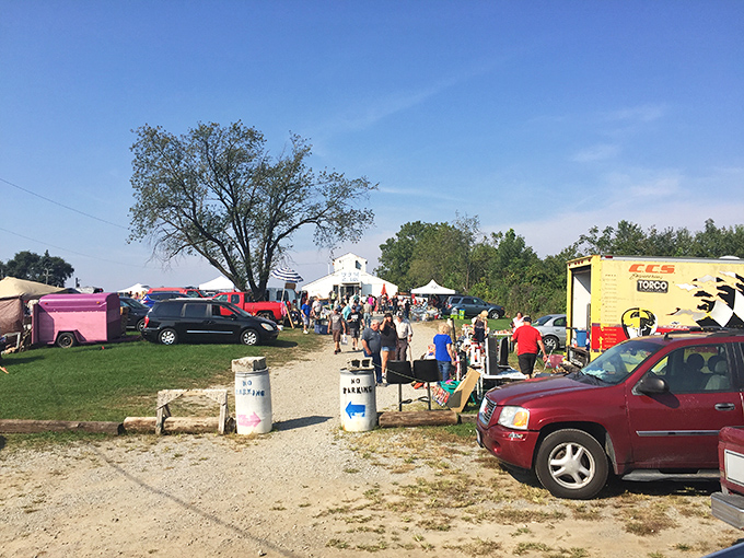 A sea of canopies and bargain hunters at Uncle John's Flea Market. Like a small city where everyone's moving sale happened at once!