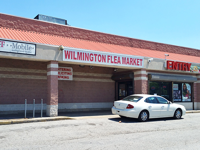 The unassuming entrance to Wilmington Flea Market - where treasures hide behind that humble storefront like diamonds in your grandmother's jewelry box.