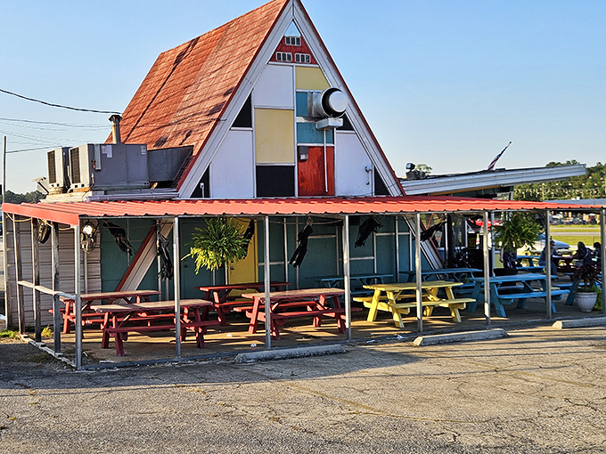 Colorful, quirky, and practically screaming "road trip destination!" – this little burger joint is like finding the pot of gold at the end of a hunger rainbow.