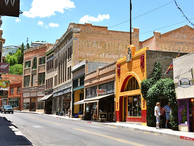 Colorful storefronts line Bisbee's main drag, where the "Belleza" sign promises beauty and the architecture delivers on that promise spectacularly.