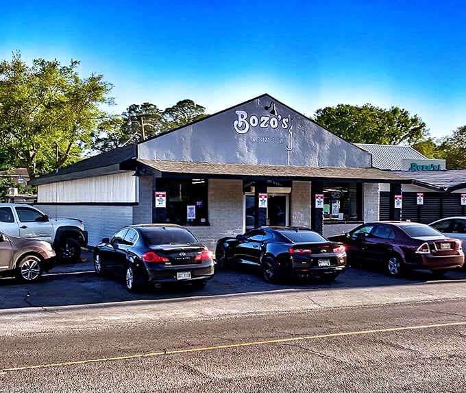 The simple storefront of Bozo's with parked cars out front tells you everything you need to know&mdash;locals crowd here for a reason.