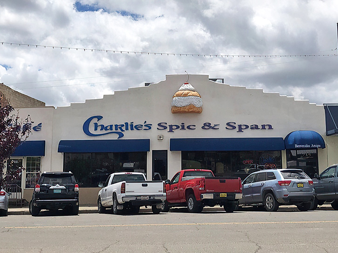That blue awning promises comfort food magic inside &ndash; the kind that makes you want to hug the chef afterward.