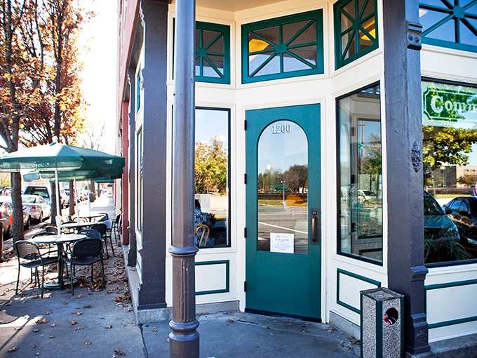 The charming teal-trimmed entrance promises sweet treasures inside, like finding the door to Willy Wonka's factory in downtown Little Rock.
