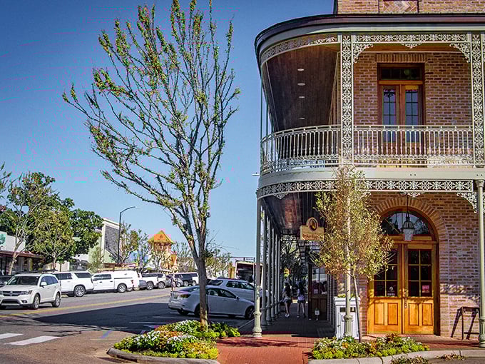 That gorgeous brick building with the wraparound balcony isn't showing off&mdash;it's just Fairhope's everyday elegance on a budget.