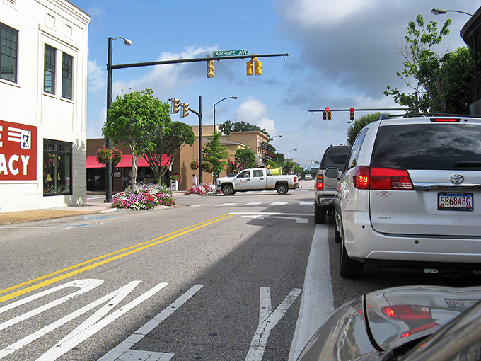 Downtown Fairhope looks like it was designed by someone who actually likes people. No wonder retirees trade skyscrapers for these charming storefronts.