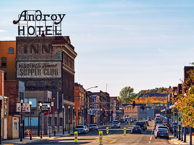 The iconic Androy Hotel sign stands tall over Hibbing, where your Social Security check stretches like the endless Minnesota sky.