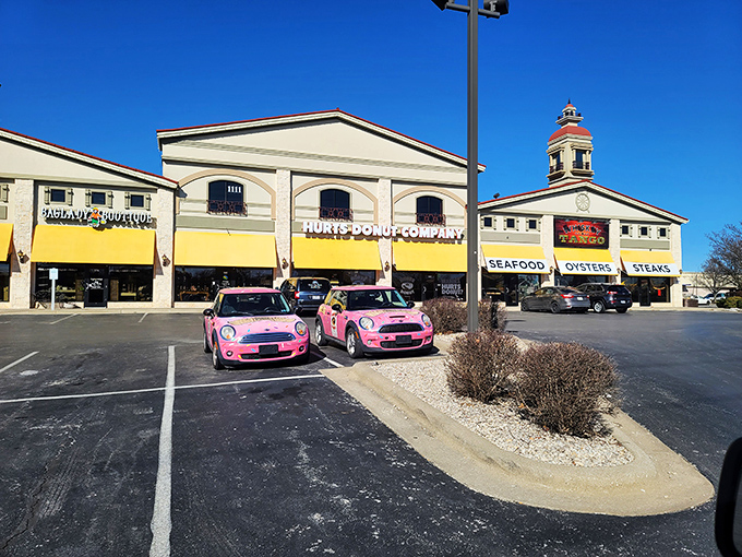 Those pink Mini Coopers parked outside Hurts Donut are the perfect preview – everything here is fun-sized in reverse!