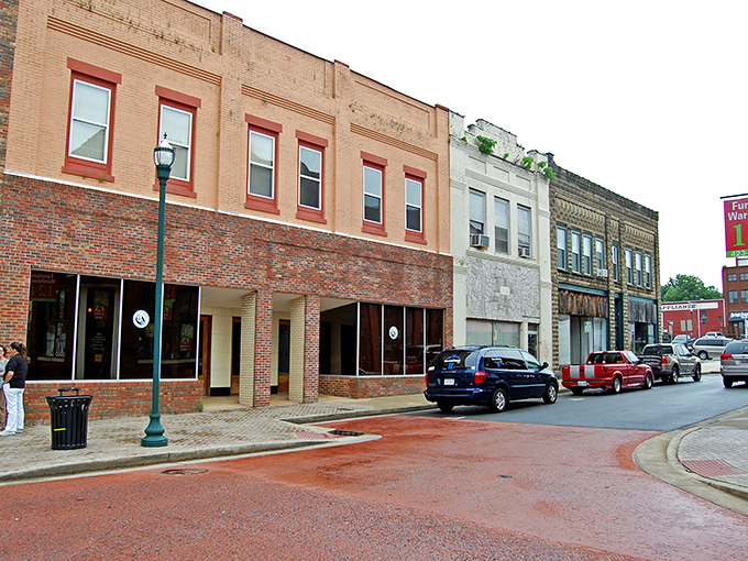The Barley Waters sign hangs like a friendly invitation to explore downtown Johnson City's revitalized streets.