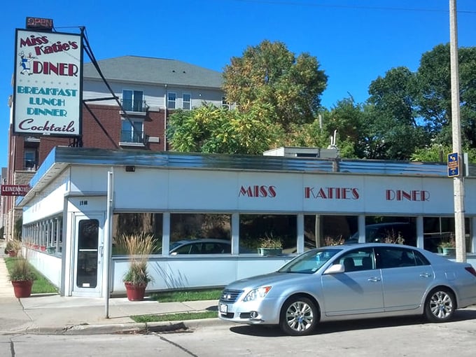 Flower boxes line the windows like colorful ambassadors welcoming you to a temple of breakfast perfection.