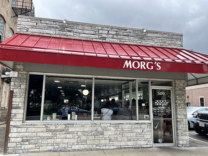 Classic stone exterior, bold red awning, and windows that promise a peek into breakfast paradise. Morg's isn't just a diner—it's a Waterloo institution.
