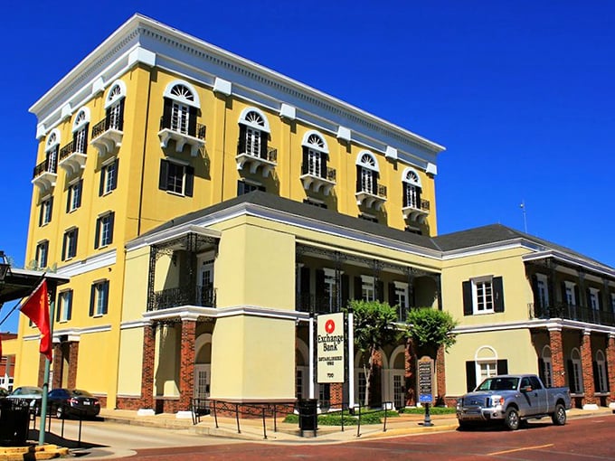 This isn't just any yellow building &ndash; it's a splash of sunshine in Natchitoches' historic district where every brick tells a story.