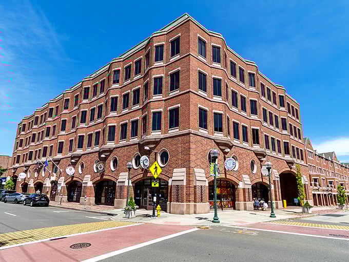 This charming brick building with porthole windows anchors a corner of New Haven, blending nautical flair with urban sophistication.