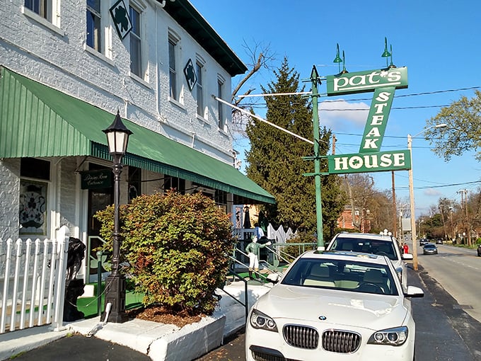 The iconic Pat's Steakhouse sign promises what lies within &ndash; a Louisville legend where steaks sizzle and memories are made.