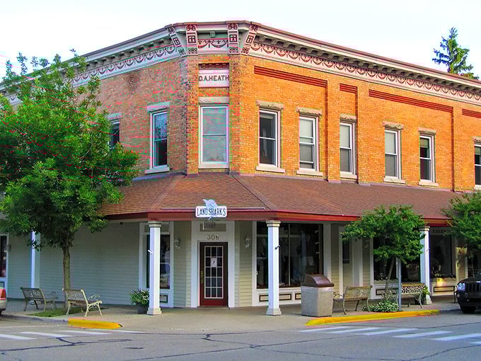 Saugatuck's brick buildings stand like friendly sentinels, inviting you to explore shops where your wallet mysteriously empties itself while your heart fills up.