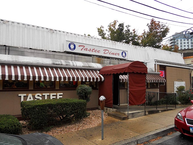 Nestled among modern buildings, this vintage diner stands defiant &ndash; a chrome-trimmed reminder that some traditions are worth preserving.