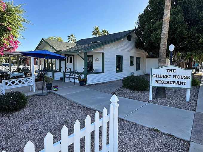 When a picket fence and palm trees meet pancakes and bacon – Gilbert House's perfect morning backdrop.