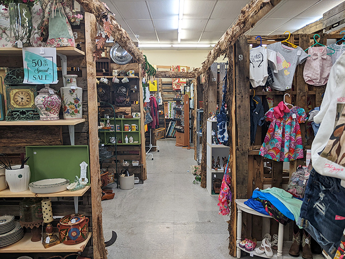 Wooden beams frame aisles of vintage treasures at This Old Attic. Every booth tells a different story waiting to be discovered.