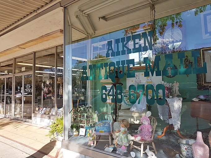 Window shopping takes on new meaning at Aiken Antique Mall, where vintage dolls and treasures beckon like old friends inviting you in for sweet tea and stories.