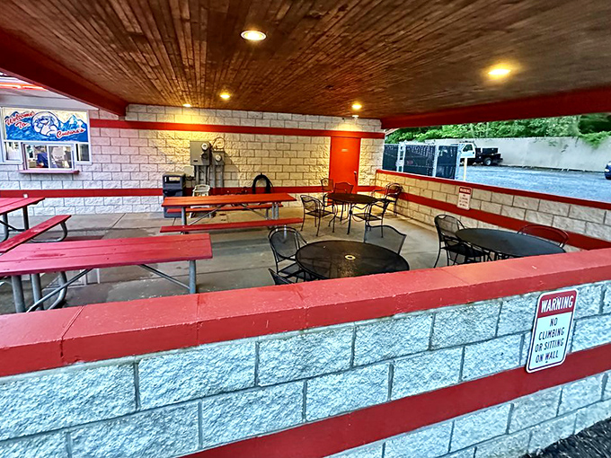 Simple picnic tables under a wooden ceiling create the perfect stage for the main event: focusing entirely on what's in your cup.