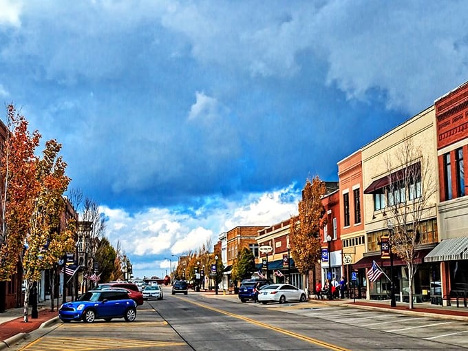 Downtown Parsons under dramatic skies – where "rush hour" means three cars at a stoplight and your blood pressure actually drops when running errands.