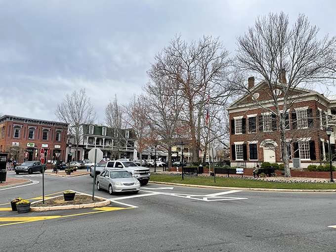 The old courthouse stands sentinel over downtown, where modern cars park alongside buildings that have witnessed nearly two centuries of Georgia history.