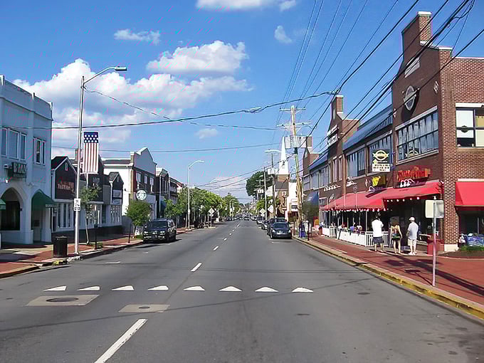 Main Street stretches before you like a Norman Rockwell painting come to life, inviting exploration of its charming storefronts.