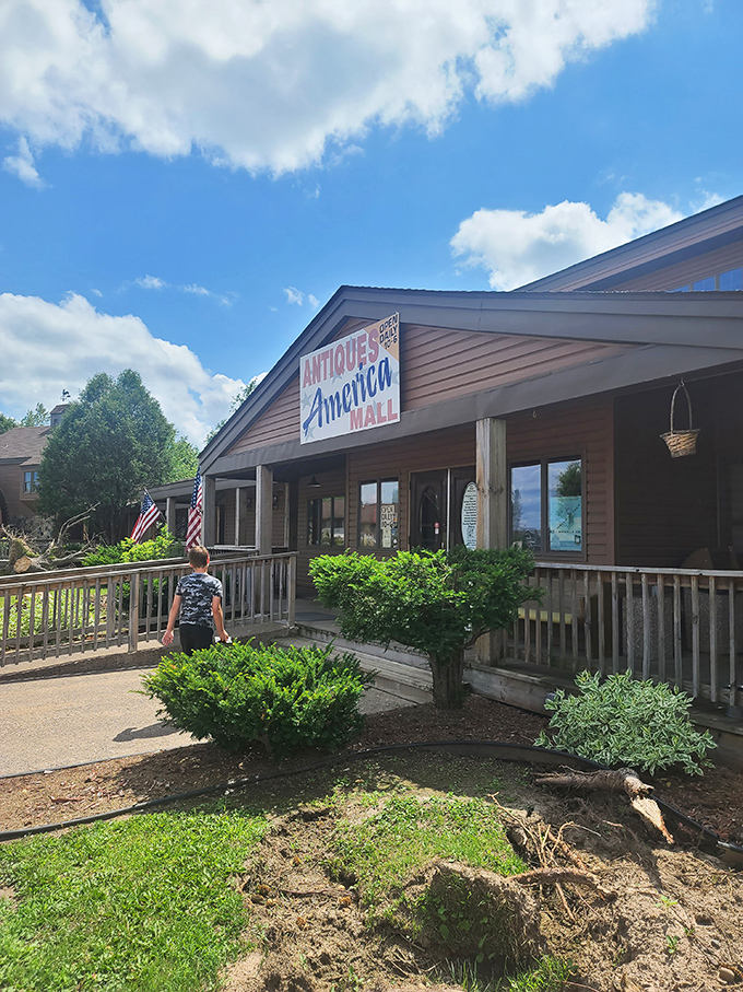 The welcoming exterior stands ready for another day of connecting people with pieces of the past. Those evergreens have witnessed countless happy discoveries.