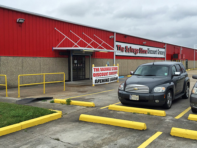 No fancy frills here&mdash;just yellow parking bumpers and a straightforward entrance that says, "Leave your pretension at the door, bring your shopping spirit."