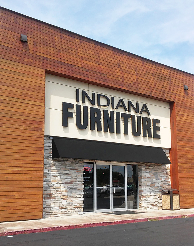 First impressions matter, and this entrance with its sleek wood cladding and stone base sets expectations high before you even step inside.