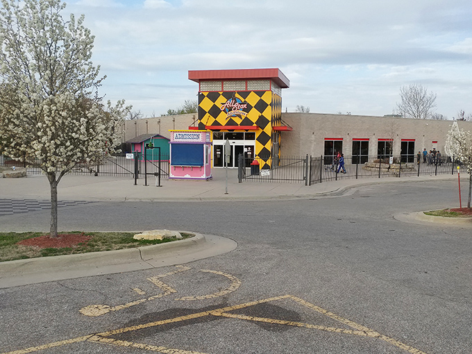 The unmistakable yellow and black checkered entrance stands like a beacon of fun in Wichita, promising adventures that don't require a passport or plane ticket.