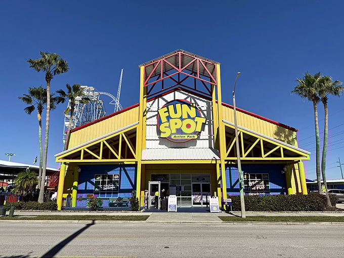 The entrance beckons with its primary-colored charm, promising old-school thrills without the need for a second mortgage or strategic planning app.