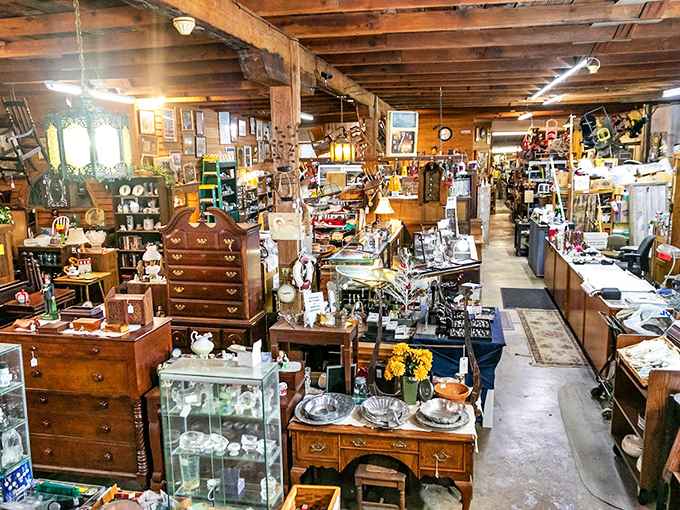 Organized chaos at its finest! Every inch tells a story, from the weathered wooden beams overhead to the carefully arranged furniture below.