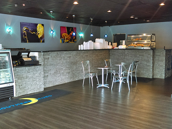 Jazz-inspired artwork and cool blue lighting create an atmosphere that feeds your soul before the food even arrives.