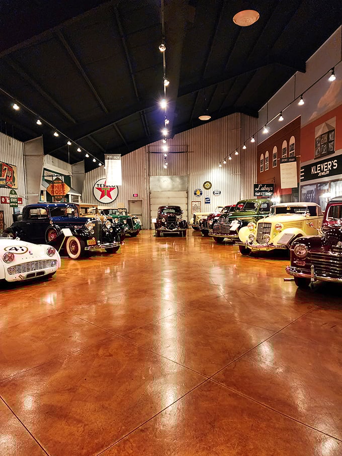 Chrome dreams and polished memories line up under perfect lighting, each vehicle telling its own story of American ingenuity and style.