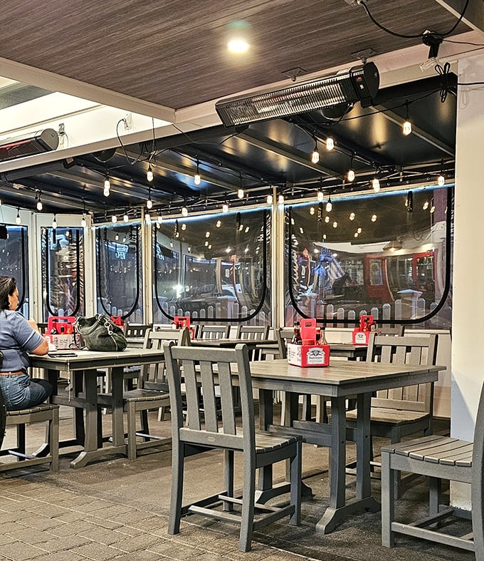 Simple wooden tables and string lights create that perfect "I'm on vacation" atmosphere, even if you're just 20 minutes from home.